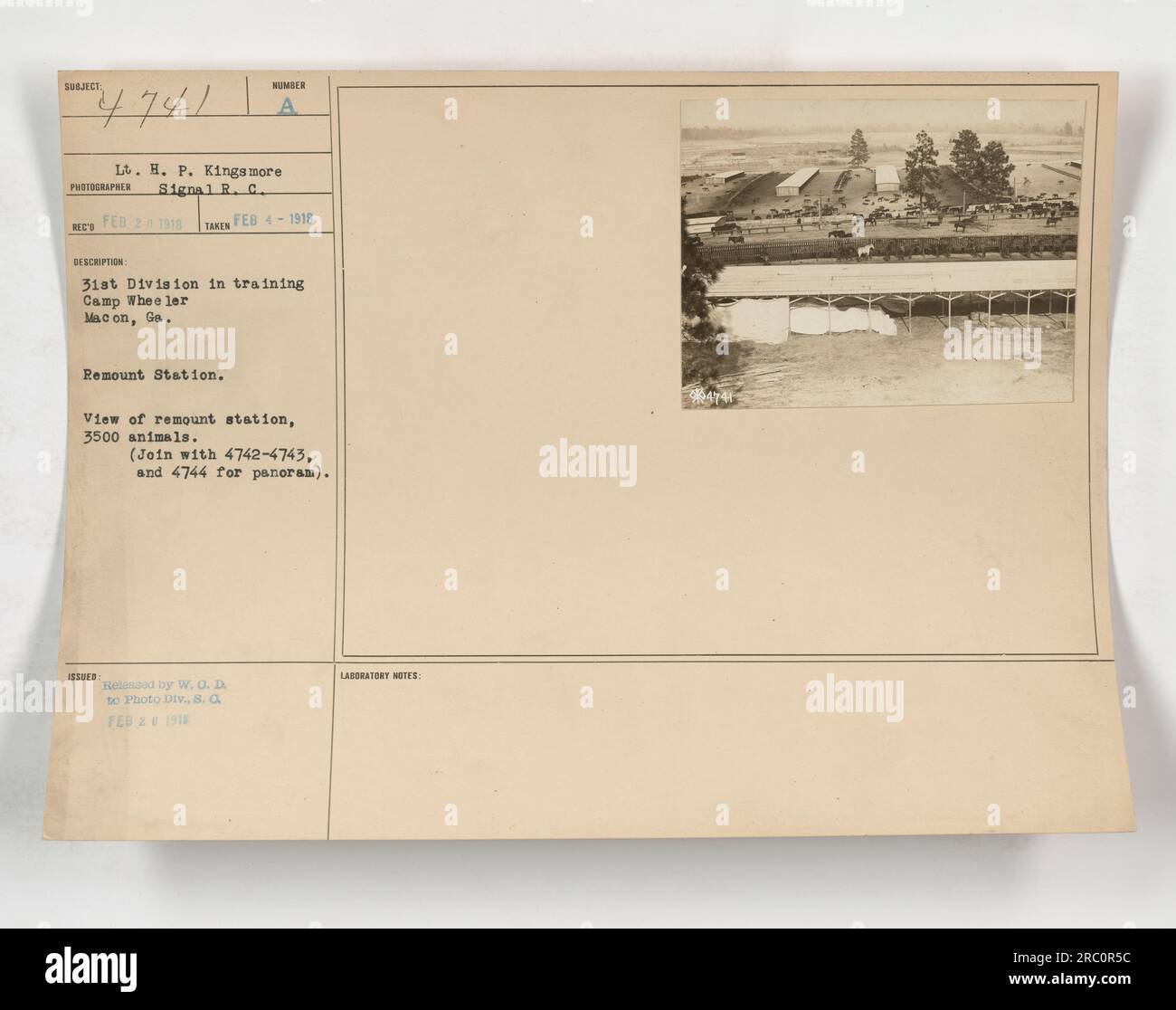 This photograph shows Lt. H.P. Kingsmore at the remount station in Camp ...