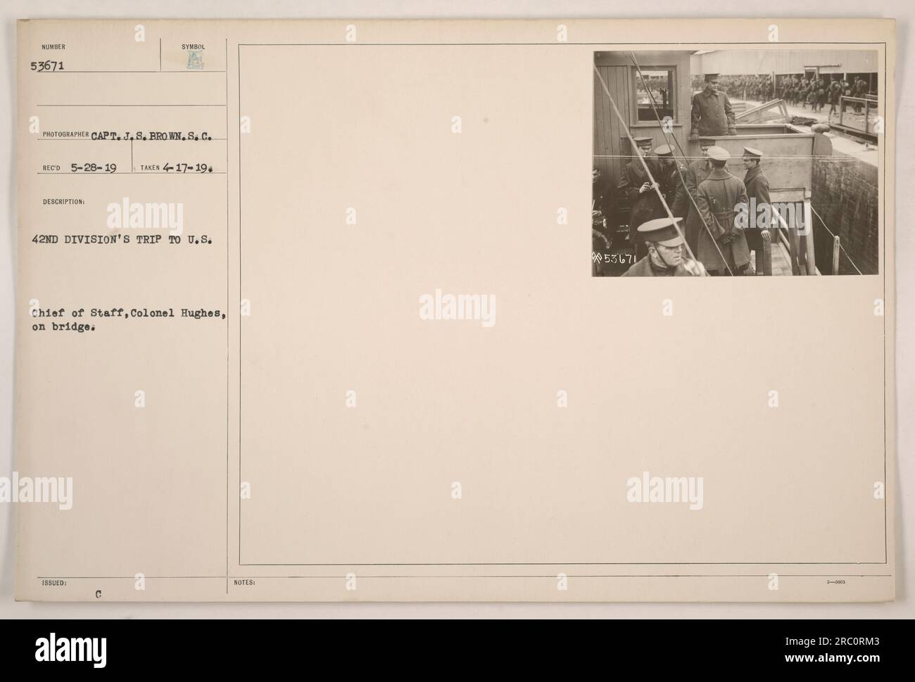 Colonel Hughes, Chief of Staff, is seen standing on a bridge during the ...