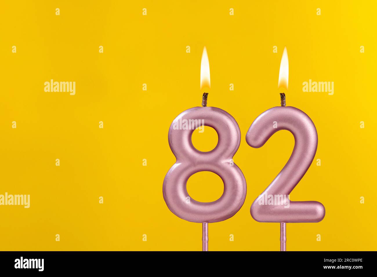Candle 82 with flame - Birthday card on yellow luxury background Stock ...