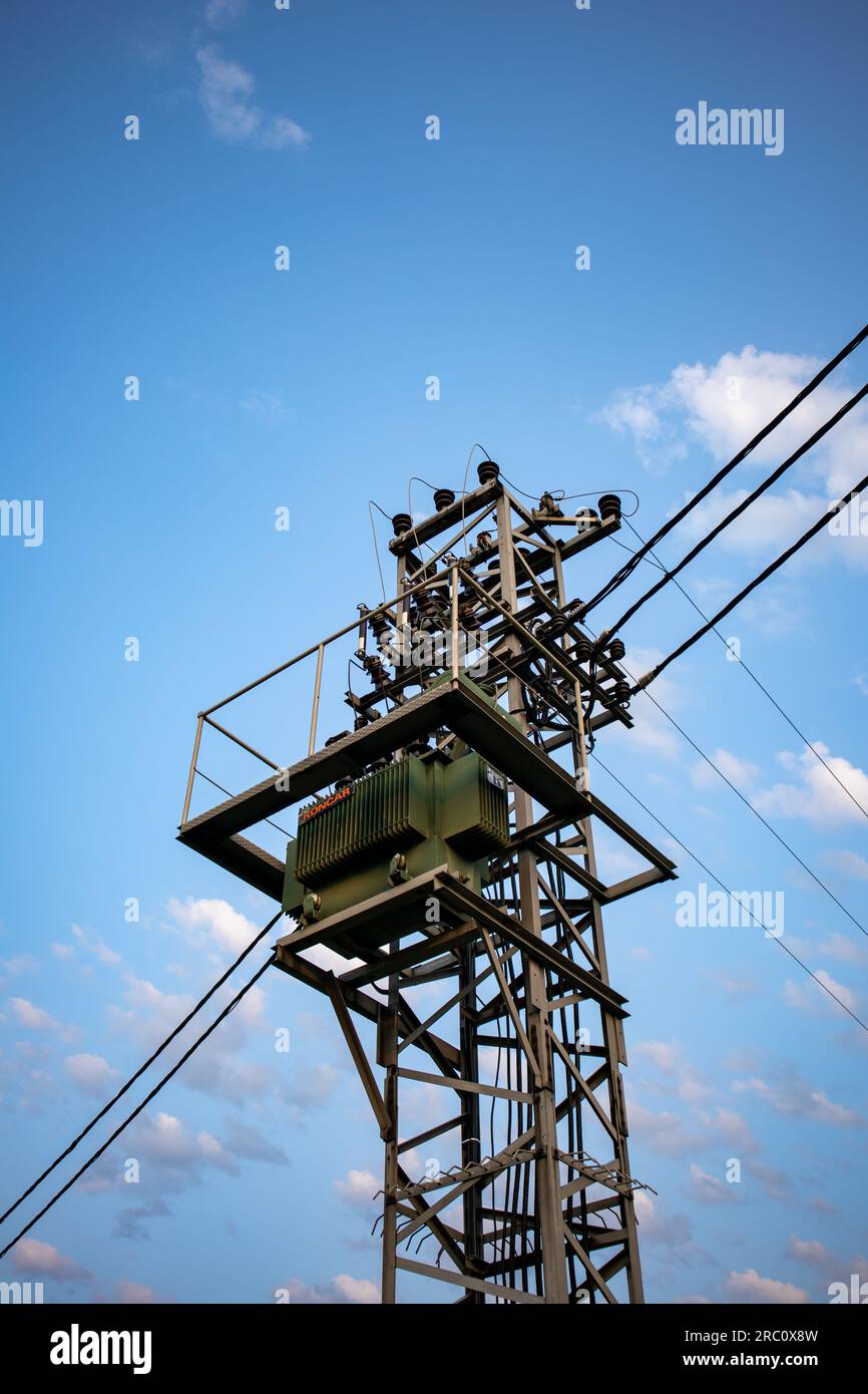 Power transformer with blue sky Stock Photo - Alamy
