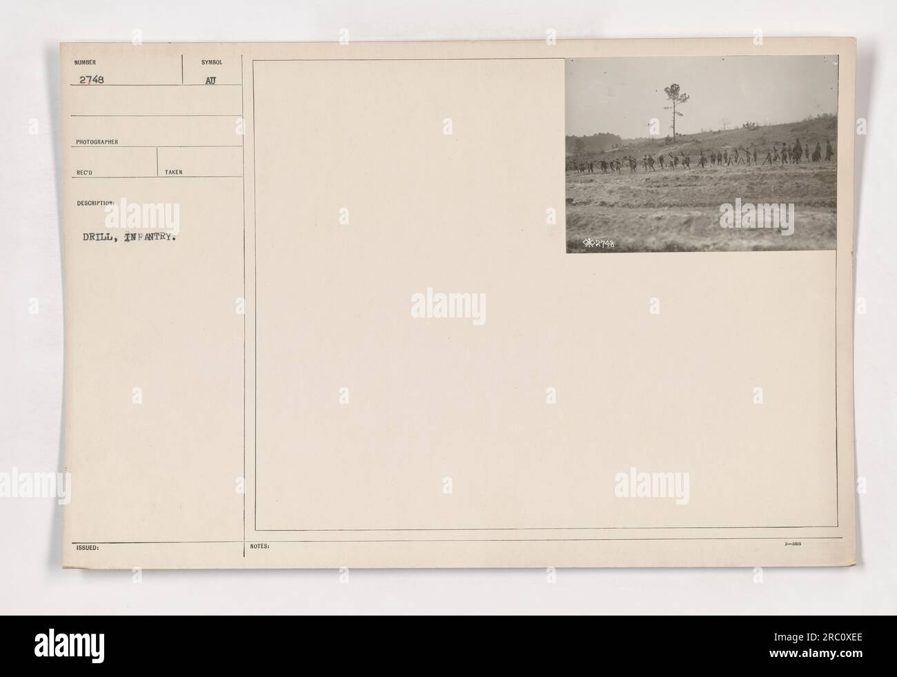 Soldiers participating in a drill exercise during World War One. They are members of the ...