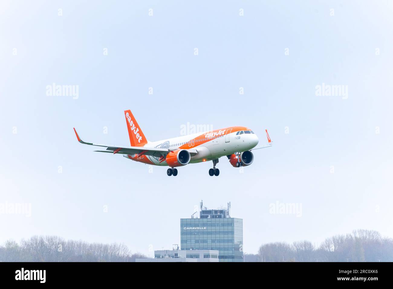 Airplane from EasyJet landing at Schiphol AirPort. Amsterdam ...