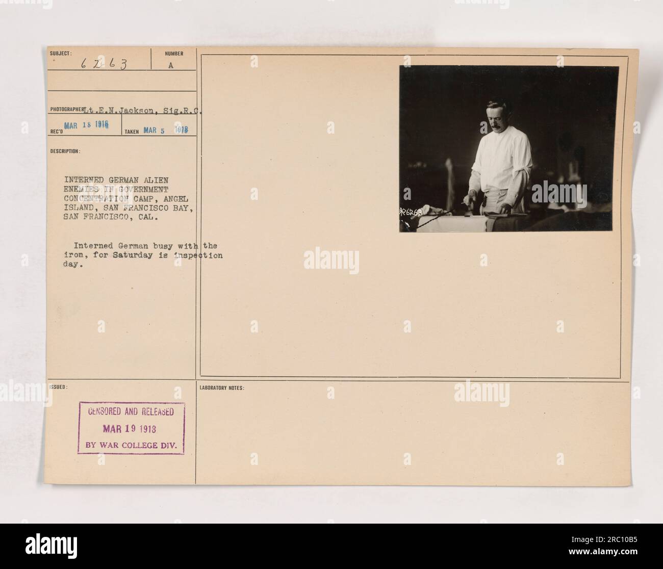 German alien enemy busy with iron in a government concentration camp on ...