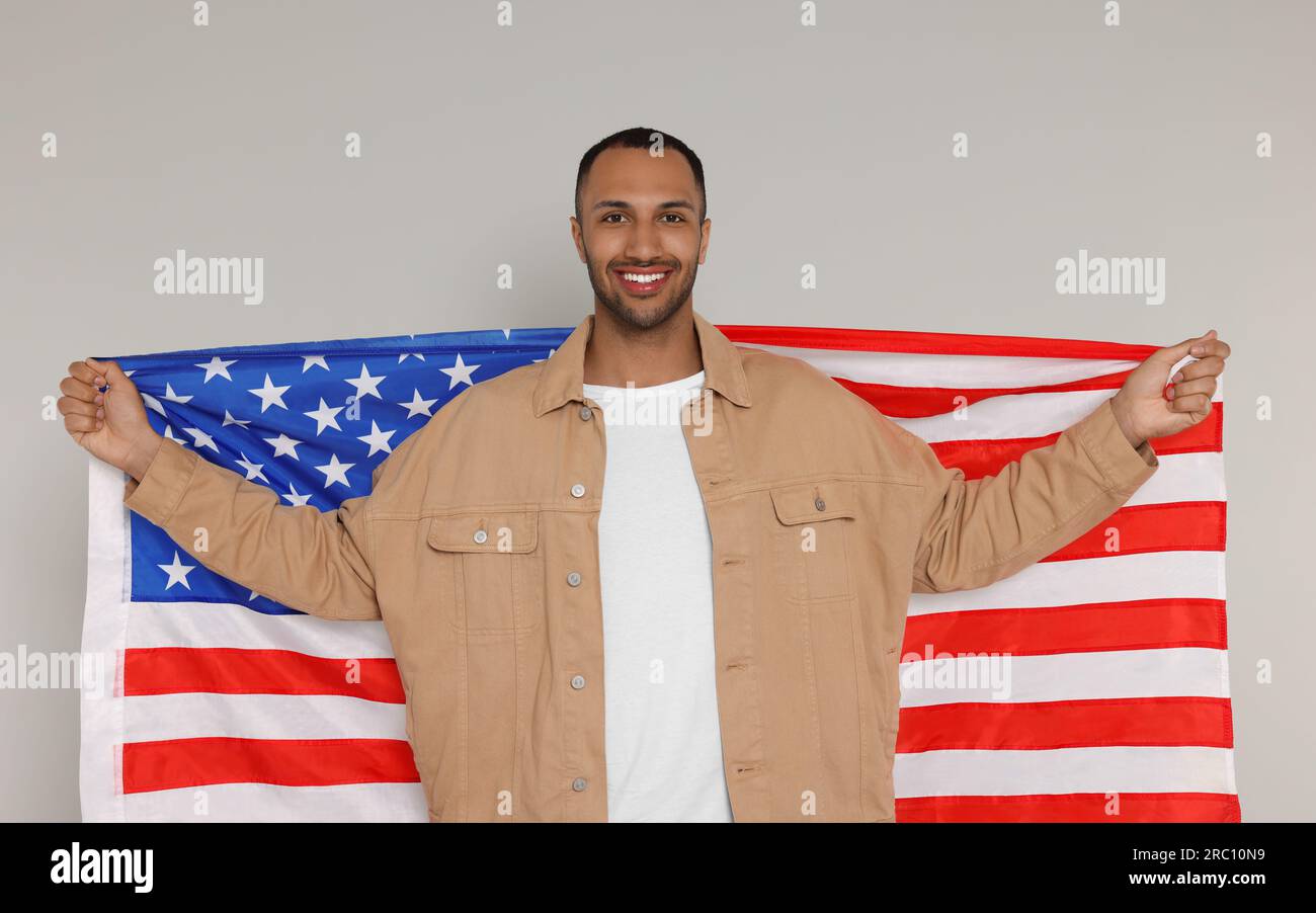 4th of July - Independence Day of USA. Happy man with American flag on ...