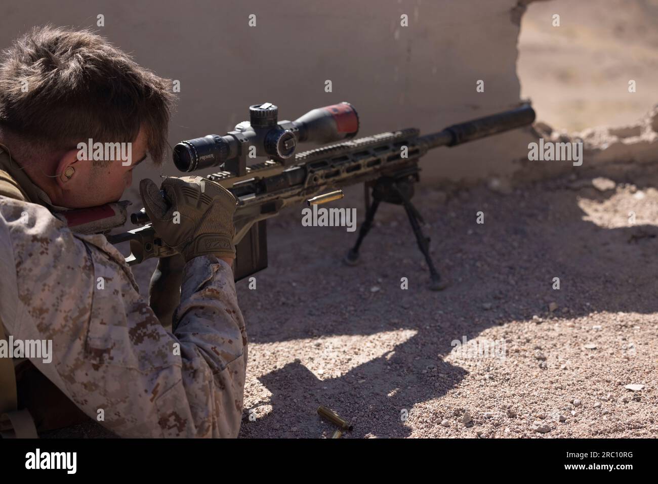 A U.S. Marine with Wraith 2 scout sniper team, 2nd Battalion, 5th Marines, 1st Marine Division ...