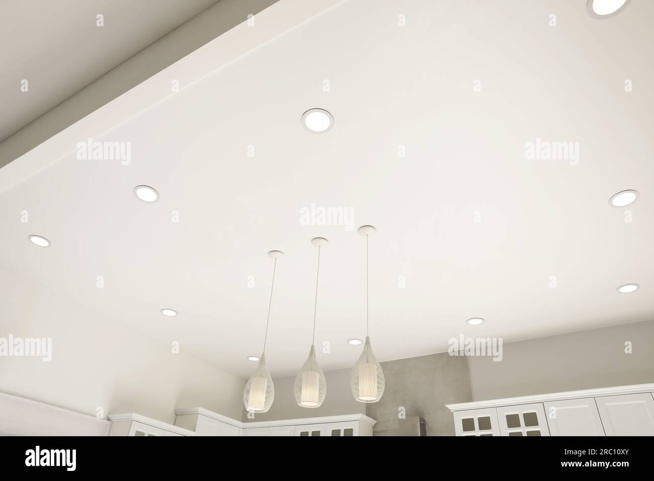 White ceiling with modern lighting in room, low angle view Stock Photo ...