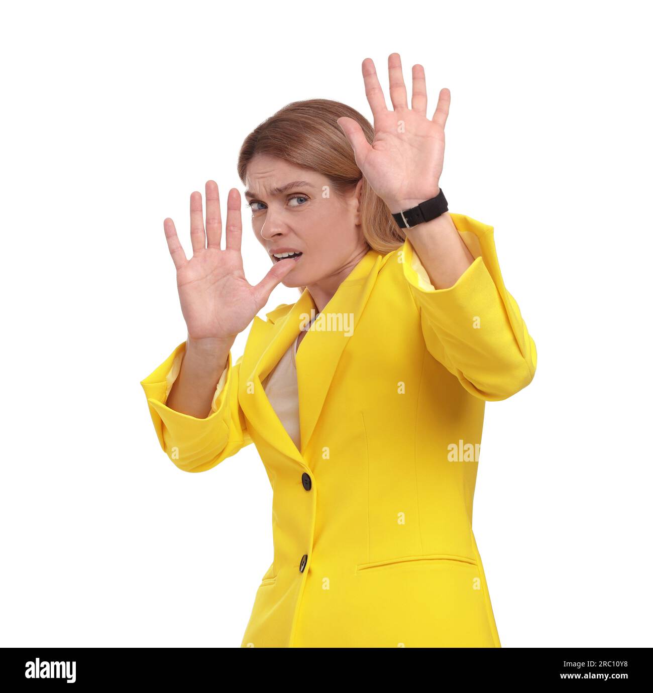 Beautiful emotional businesswoman avoiding something on white ...