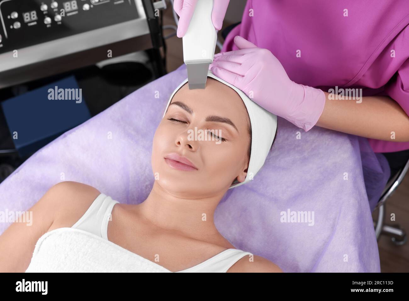 Young woman undergoing cosmetic procedure in beauty salon. Microcurrent therapy Stock Photo - Alamy