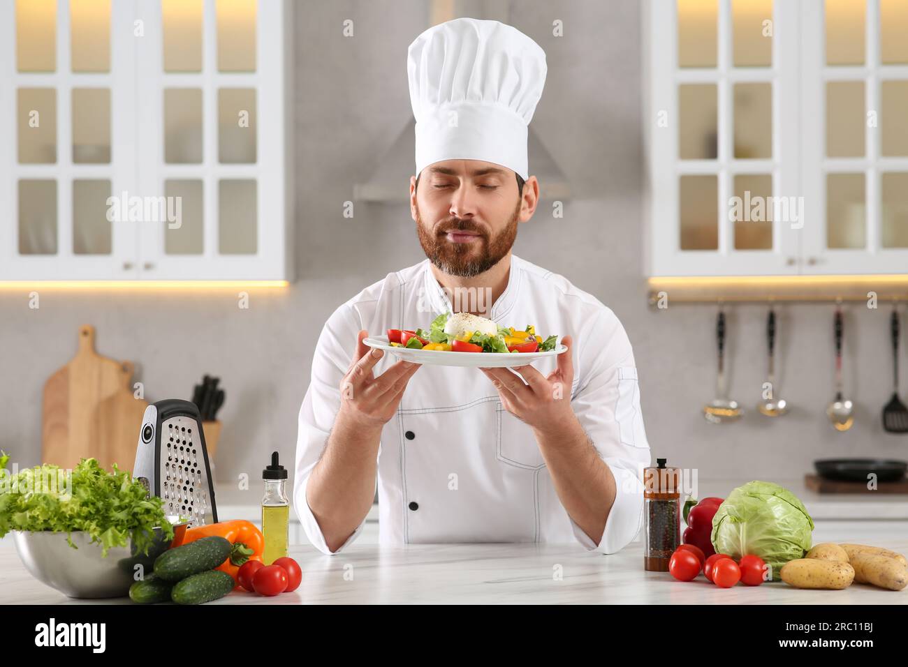 Chef smelling salad hi-res stock photography and images - Alamy