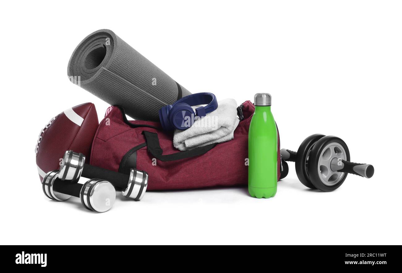 Gym bag with sports equipment on white background Stock Photo - Alamy