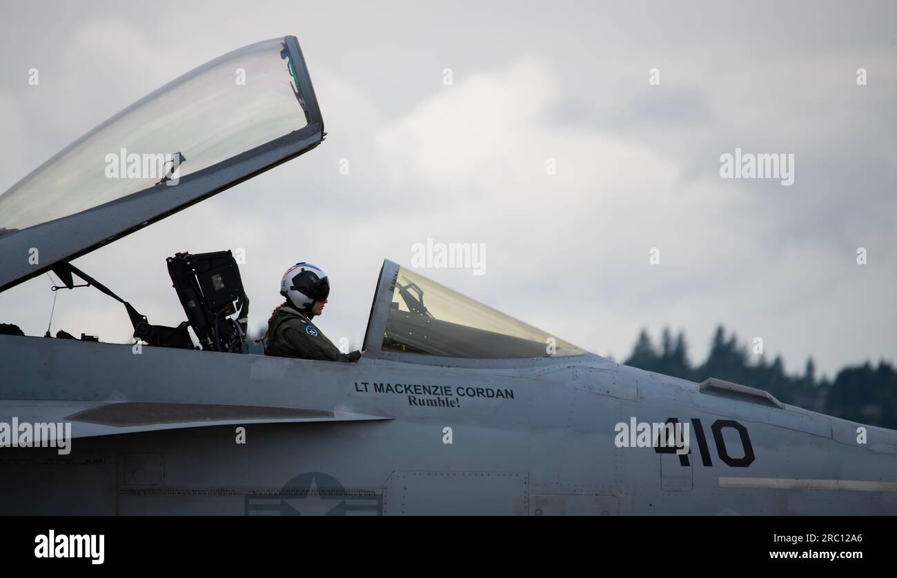U.S. Navy pilot, Lt. Mackenzie "Rumble" Cordan, sits in the cockpit of ...