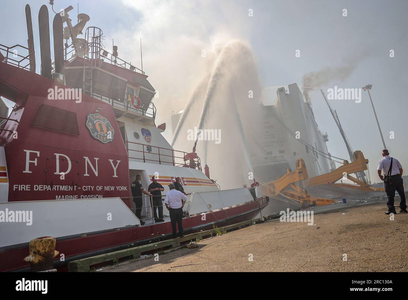 New York City Fire Department personnel respond to a fire on the motor ...