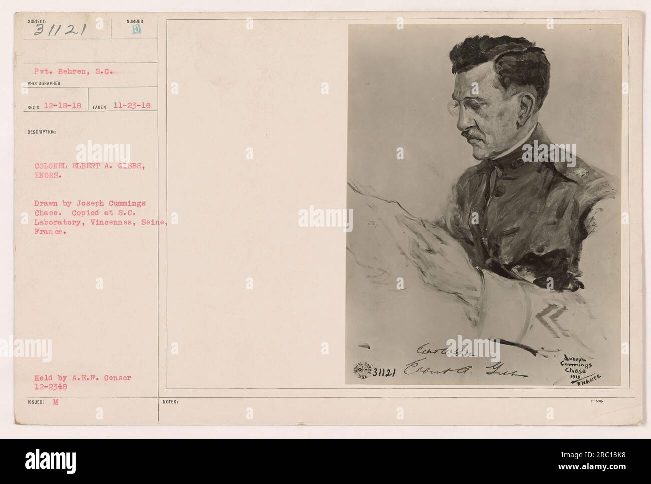 Pvt. Behren, S.C. working on a drawing by Joseph Cummings Chase, under ...