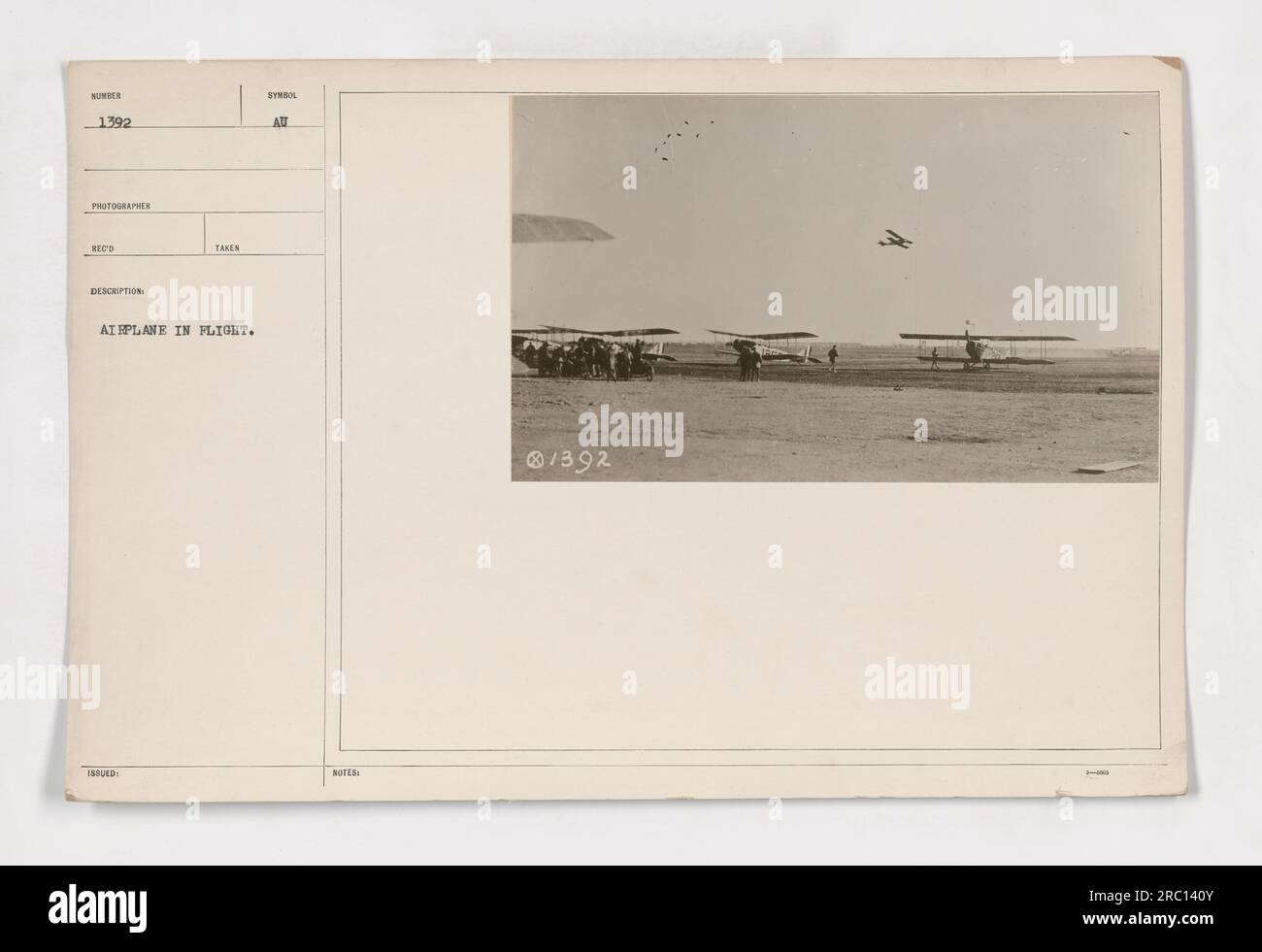 Image 111-SC-1392 shows an airplane in flight captured by photographer ...