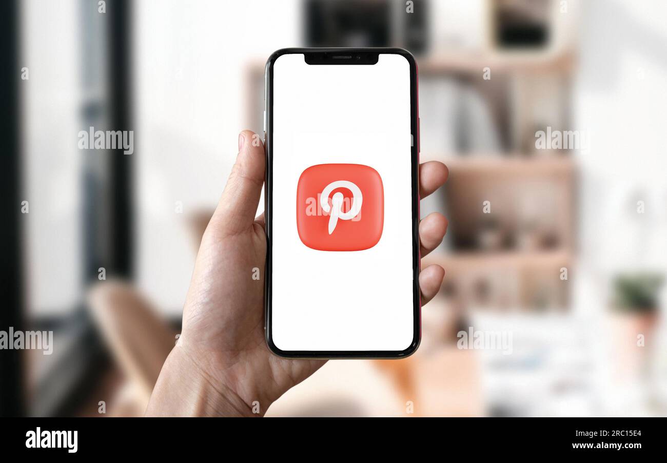 In this photo illustration, Pinterest logo seen displayed on the screen ...