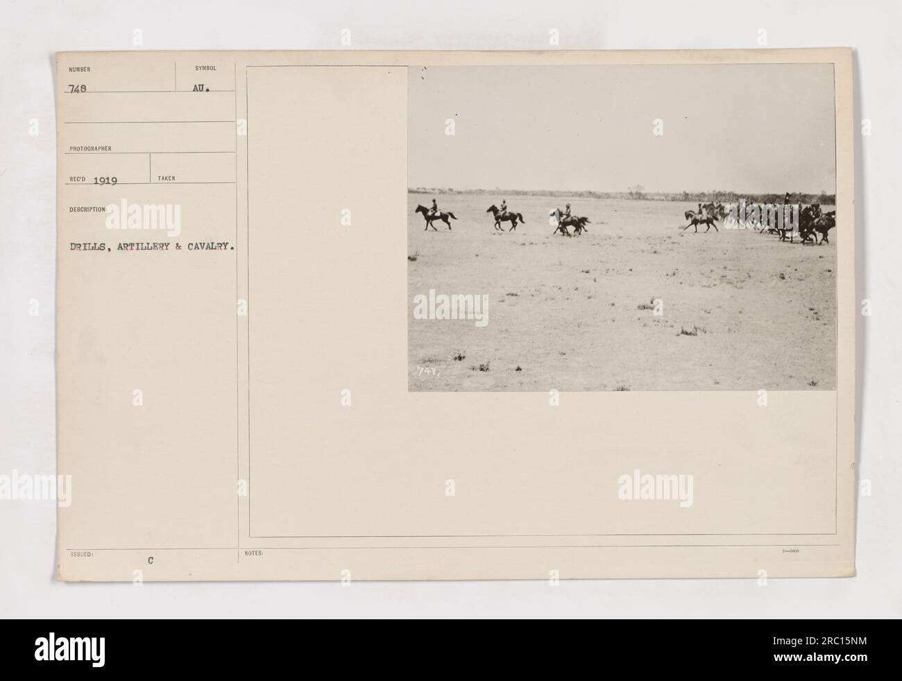 Soldiers participating in a drill exercise for artillery and cavalry during World War One. The ...