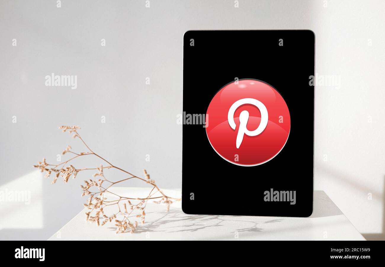 In this photo illustration, Pinterest logo seen displayed on the screen ...