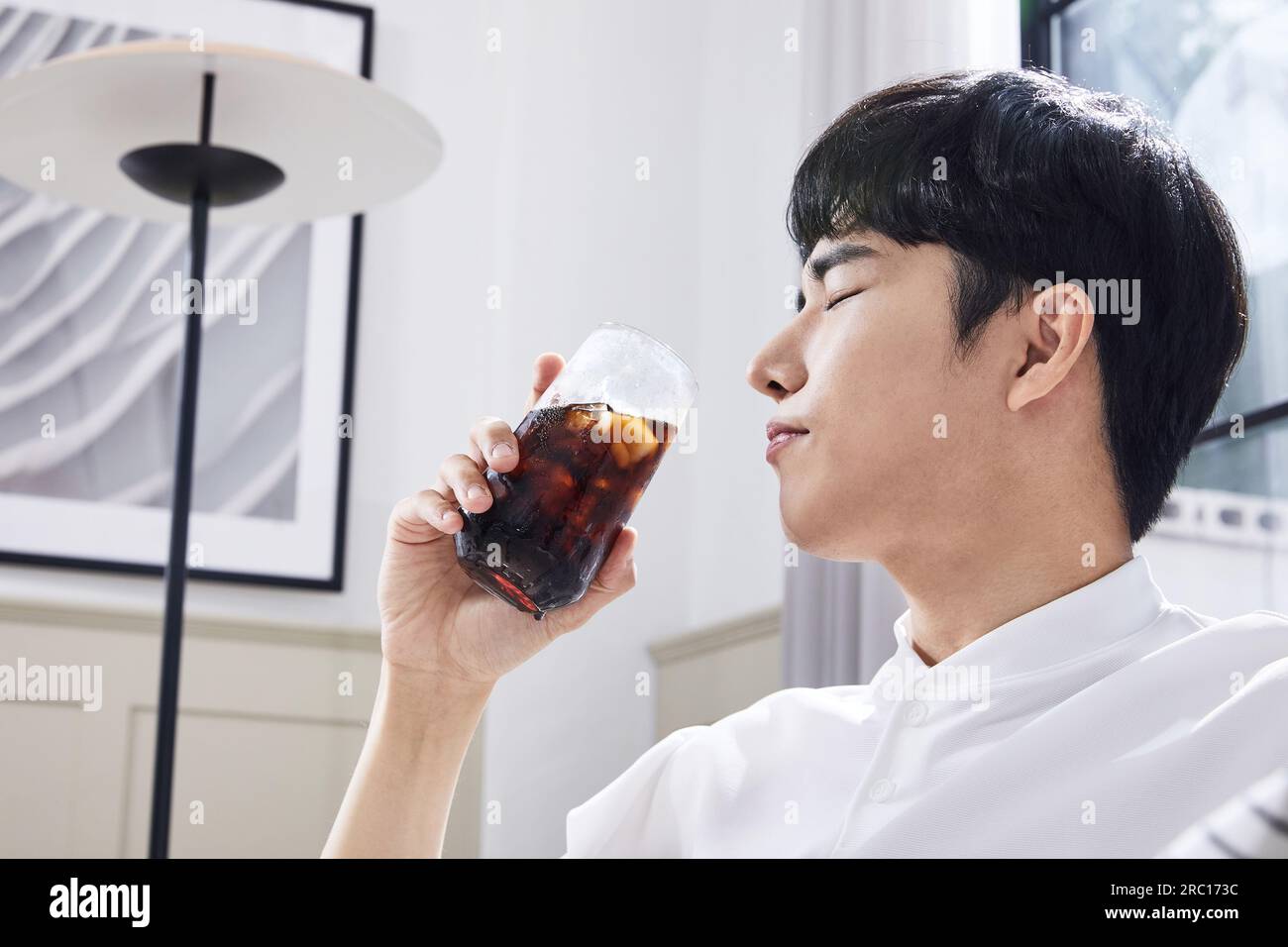 summer lifestyle, korean asian young man drinking ice coffee Stock ...