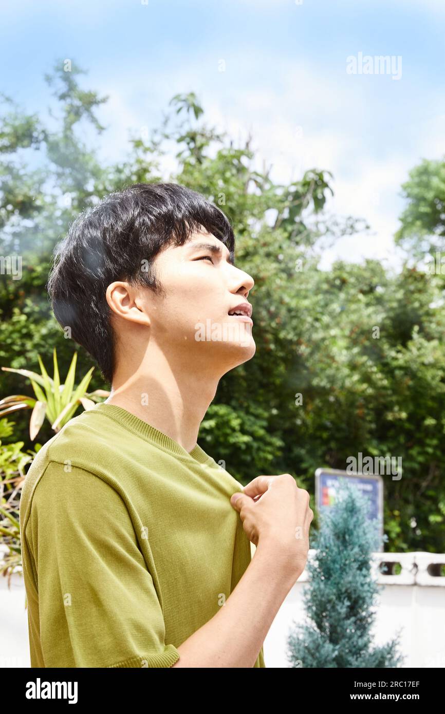 summer lifestyle, korean asian young man wiping sweat Stock Photo - Alamy