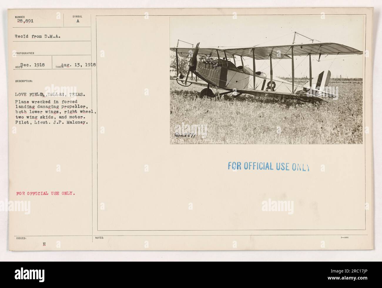 "In this photograph, taken in December 1918, a plane is shown wrecked ...