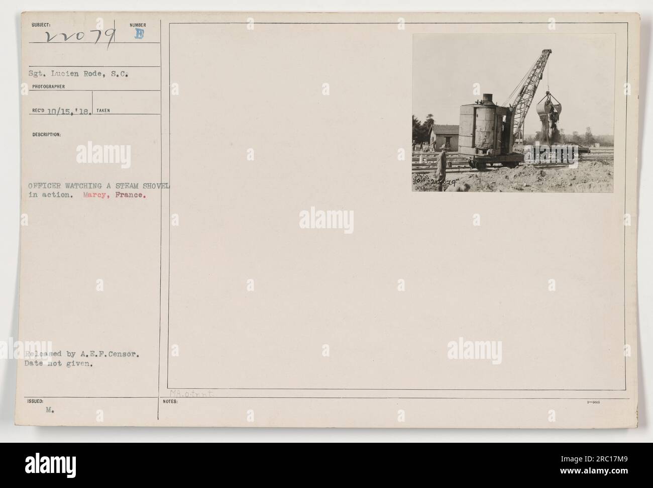 Sgt. Lucien Rode, SC, watching a steam shovel in action in Marcy ...