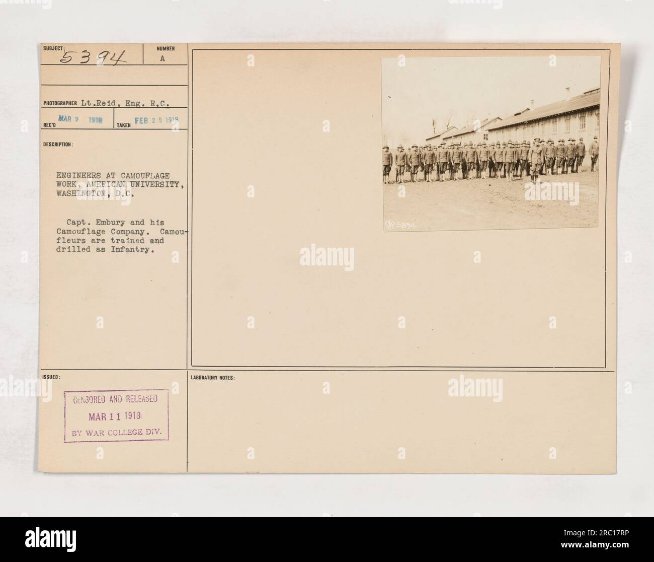 Caption: "American engineers at camouflage work at the American ...