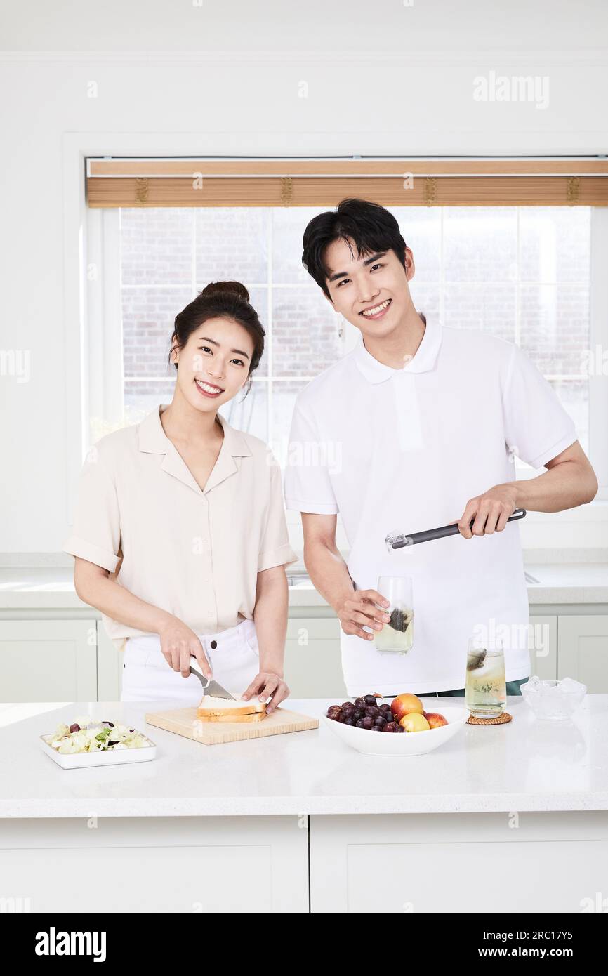 summer lifestyle, korean asian young couple cooking in kitchen Stock ...
