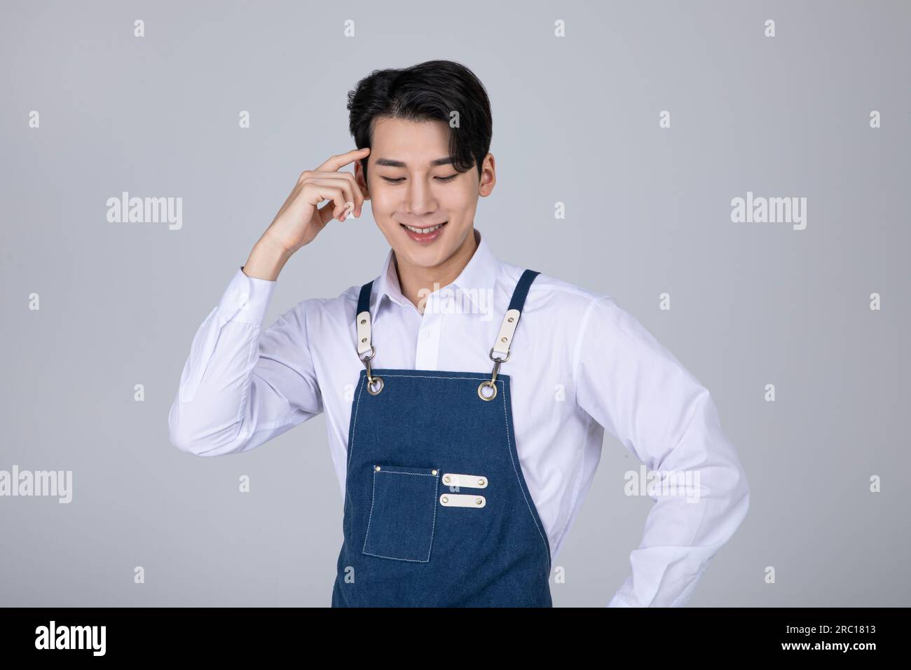 millennials and gen z, korean asian young man standing with hand motion ...