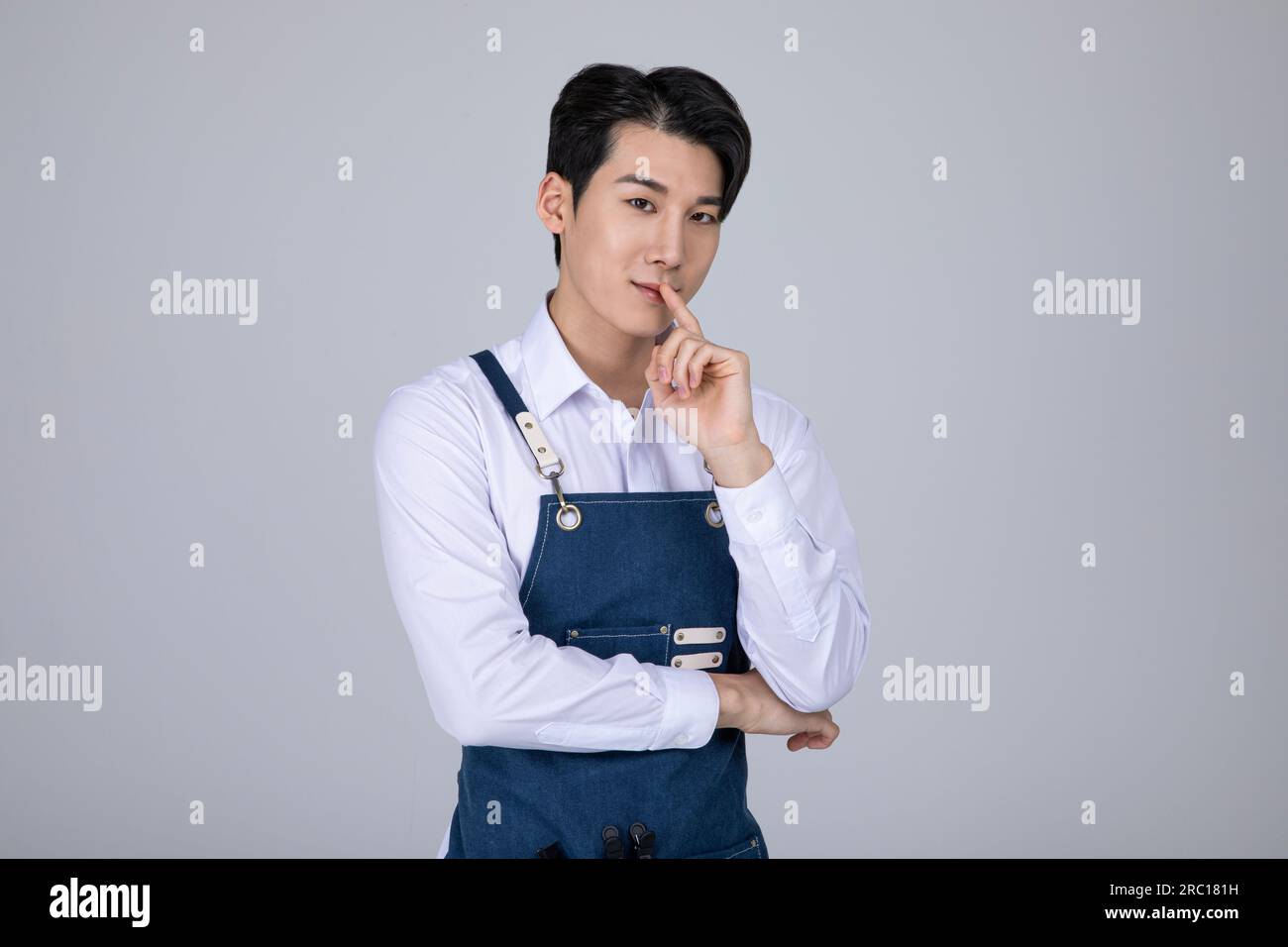 millennials and gen z, korean asian young man standing with hand motion ...