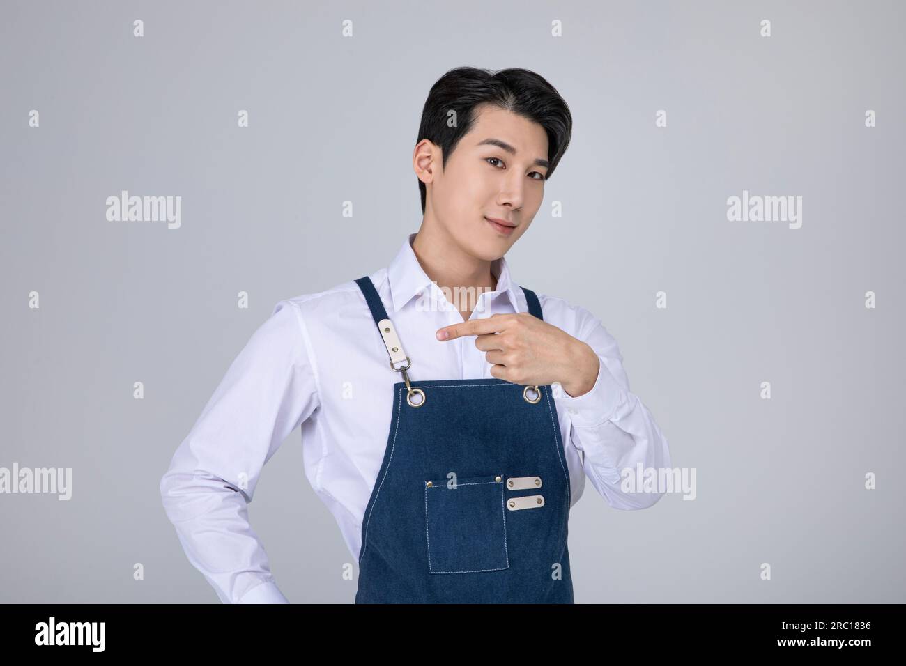 millennials and gen z, korean asian young man pointing Stock Photo - Alamy