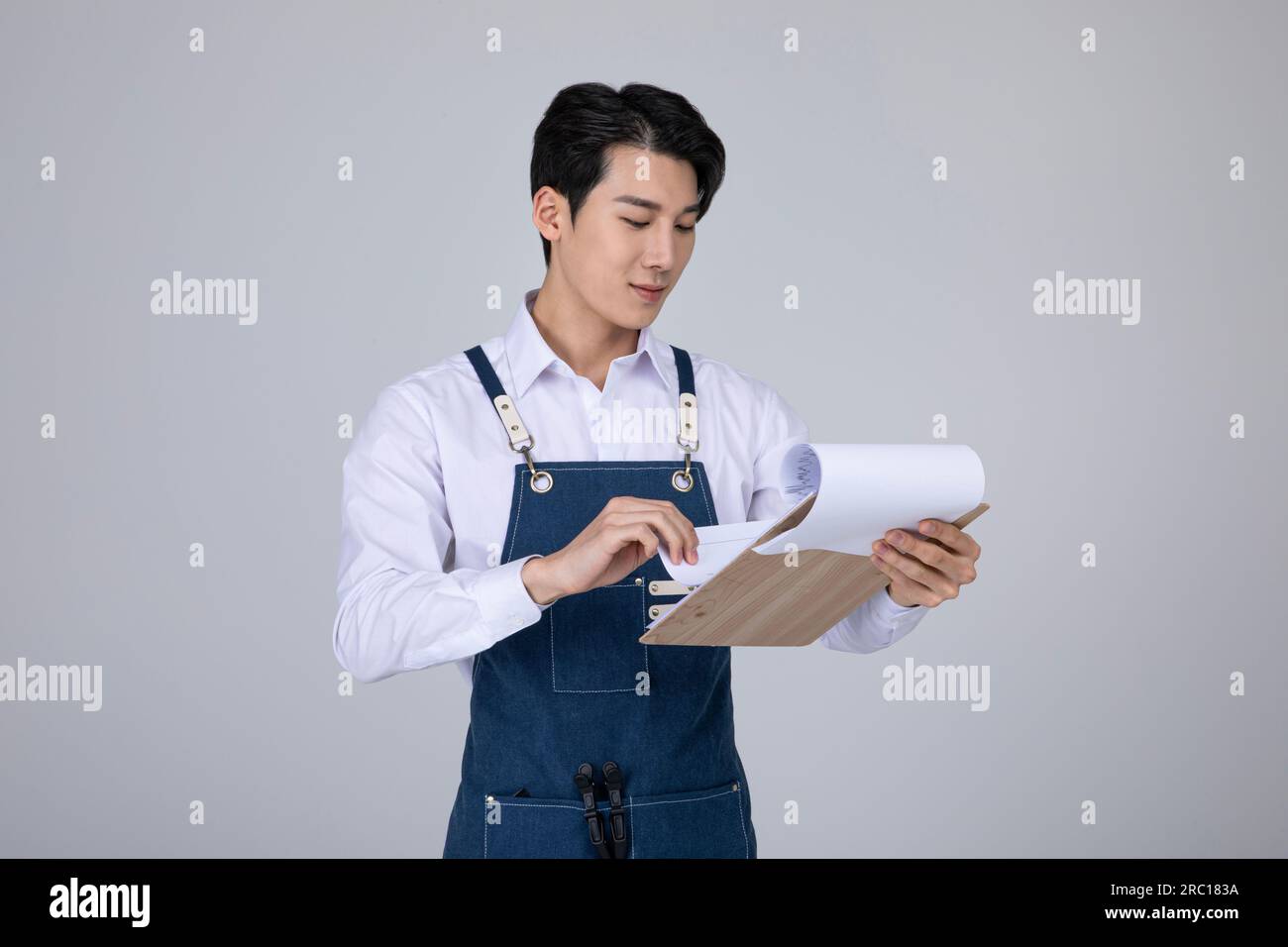 millennials and gen z, korean asian young man holding documents Stock ...
