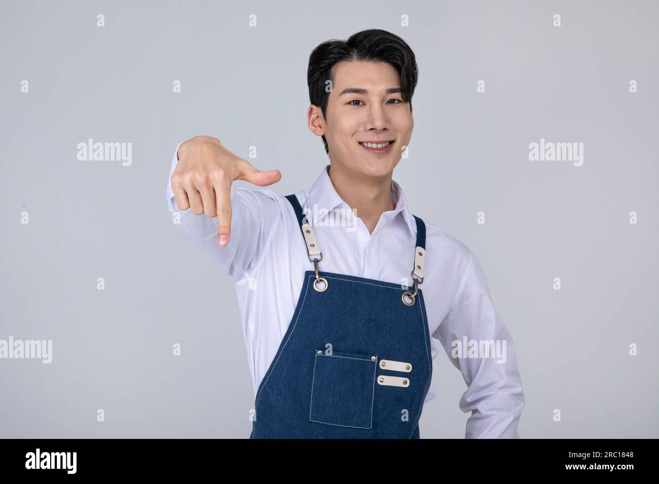 millennials and gen z, korean asian young man pointing Stock Photo - Alamy