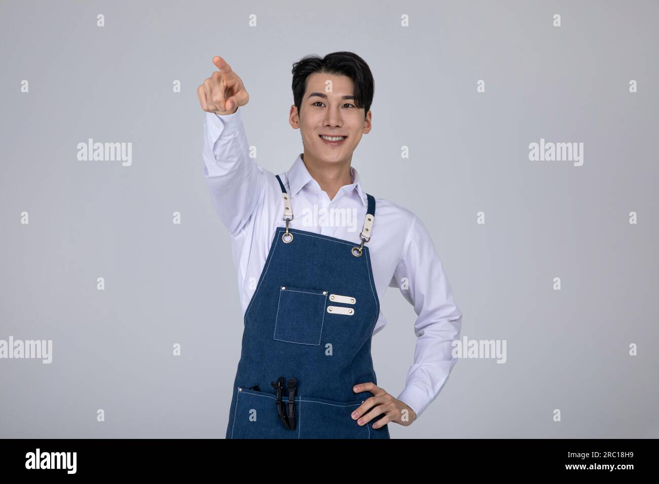 millennials and gen z, korean asian young man pointing Stock Photo - Alamy