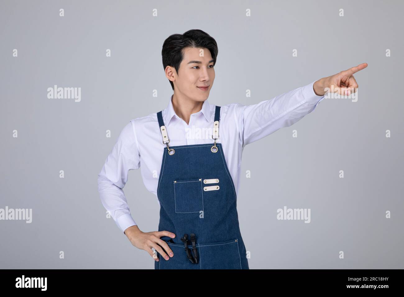 millennials and gen z, korean asian young man pointing Stock Photo - Alamy