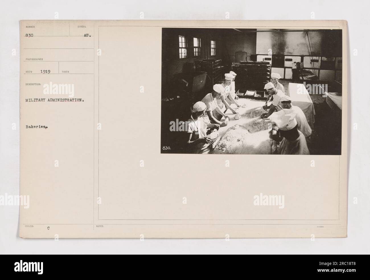Soldiers working in a bakery at Camp Washington, D.C. in 1919 under ...