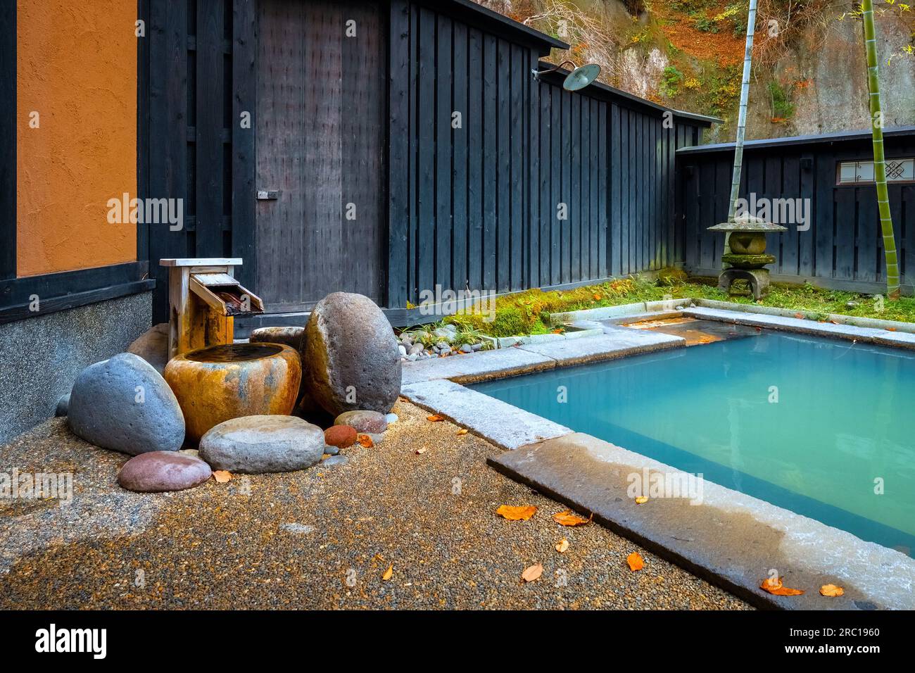 Kumamoto, Japan - Nov 22 2022: An open-air public bath surrounded by ...