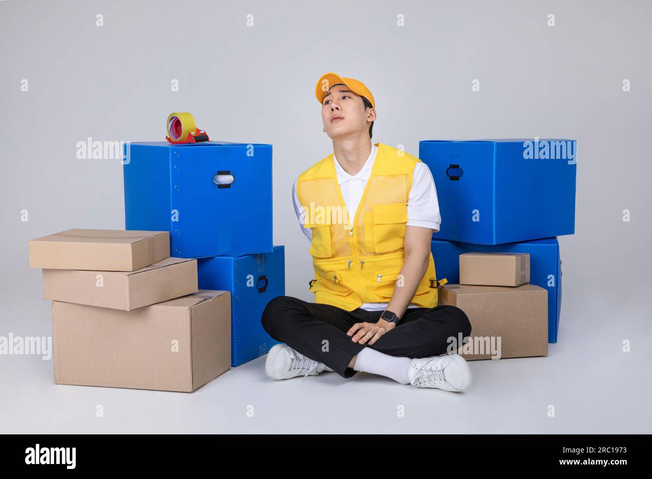 millennials and gen z, korean asian young man resting next to moving ...