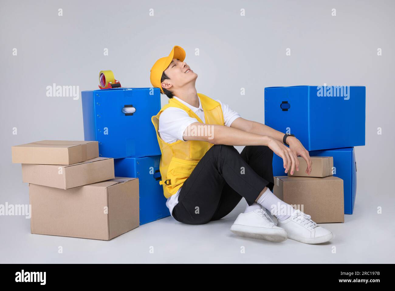 millennials and gen z, korean asian young man resting next to moving ...