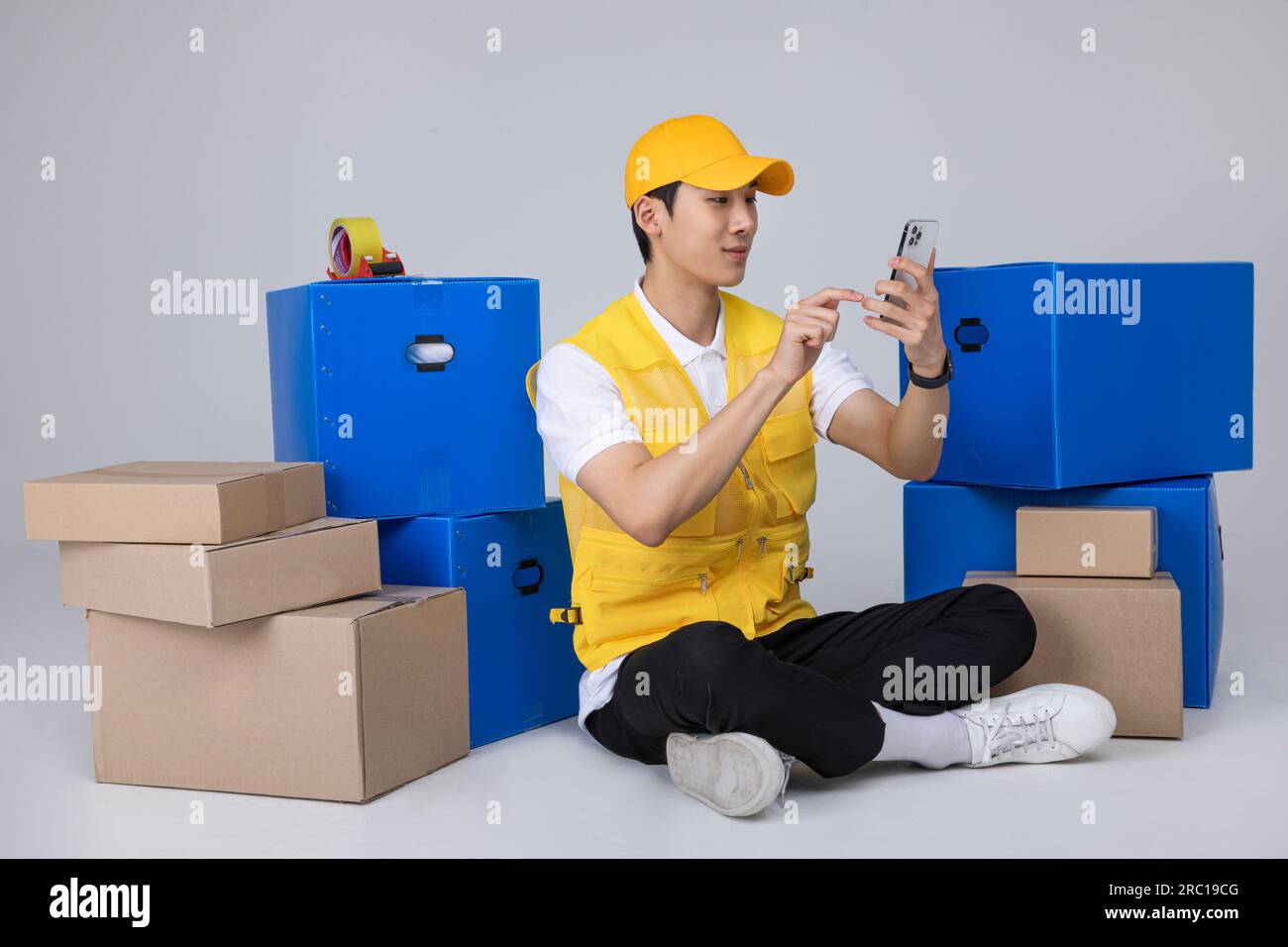 millennials and gen z, korean asian young man resting next to moving ...