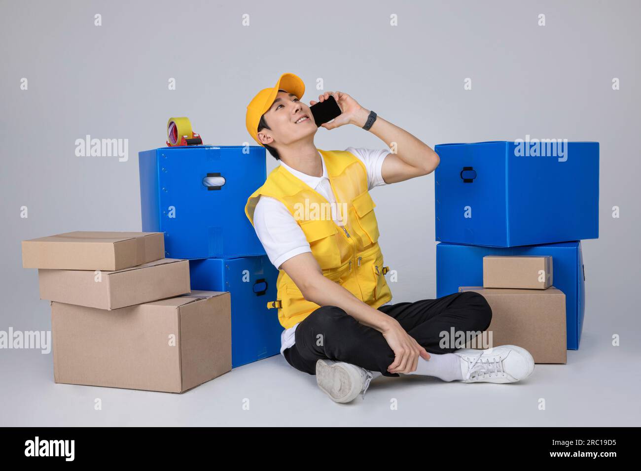 millennials and gen z, korean asian young man resting next to moving ...