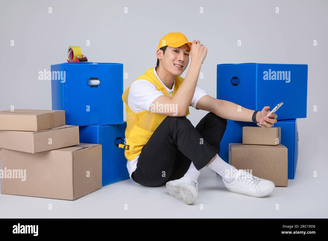 millennials and gen z, korean asian young man resting next to moving ...
