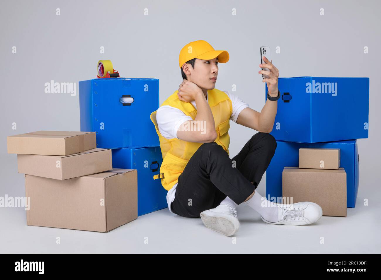 millennials and gen z, korean asian young man resting next to moving ...