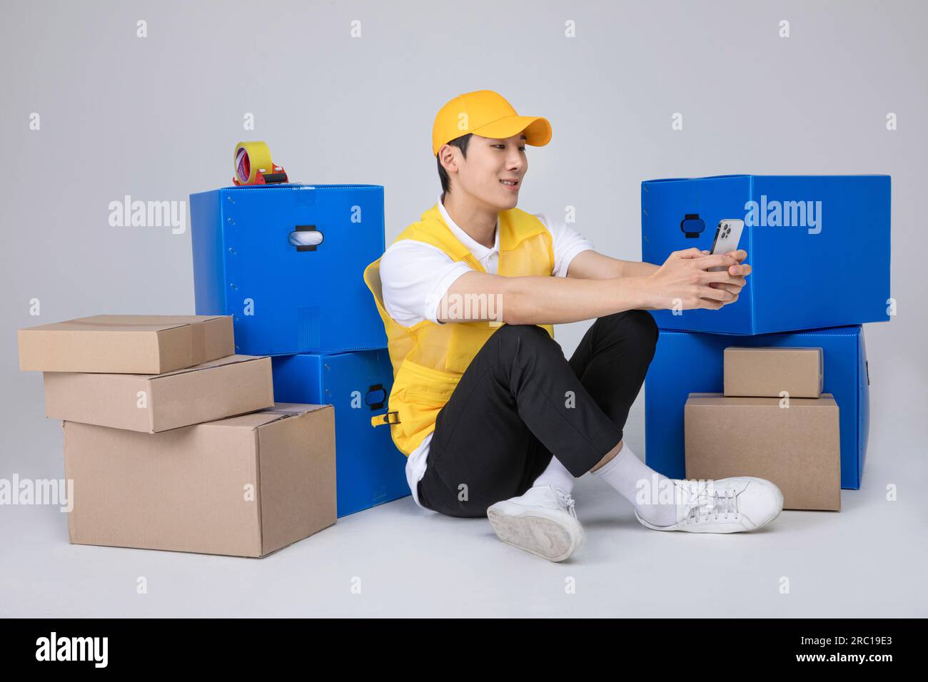 millennials and gen z, korean asian young man resting next to moving ...