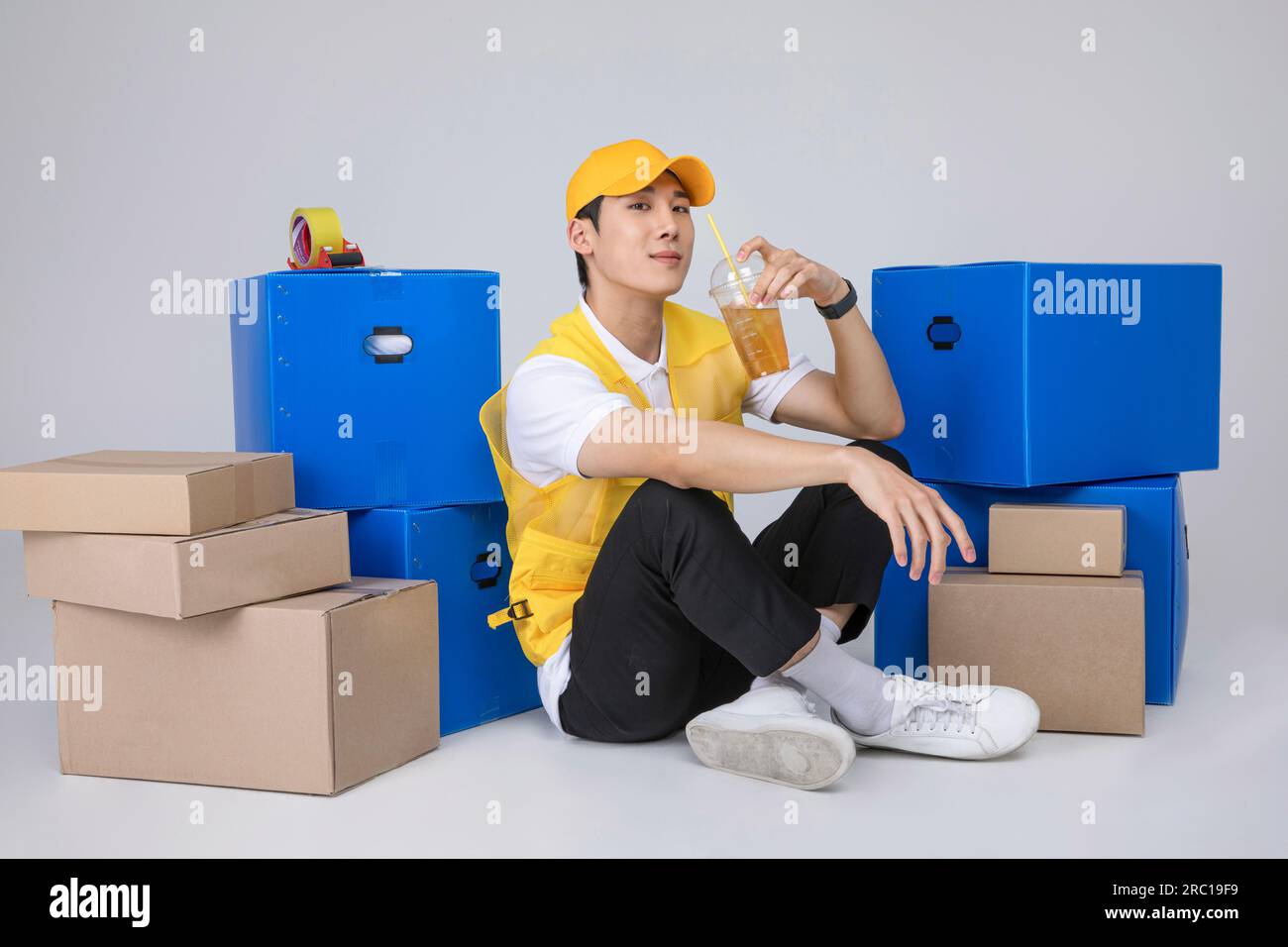 millennials and gen z, korean asian young man resting next to moving ...