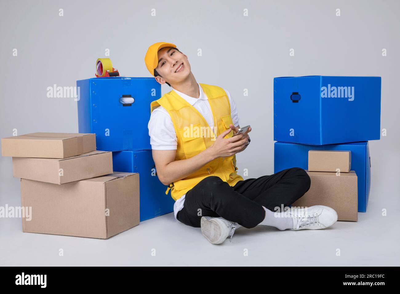 millennials and gen z, korean asian young man resting next to moving ...