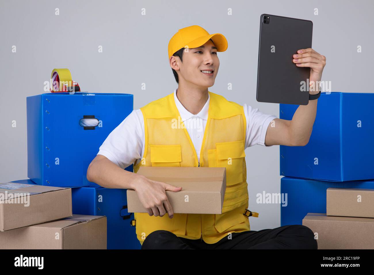 millennials and gen z, korean asian young man working on tablet pc ...
