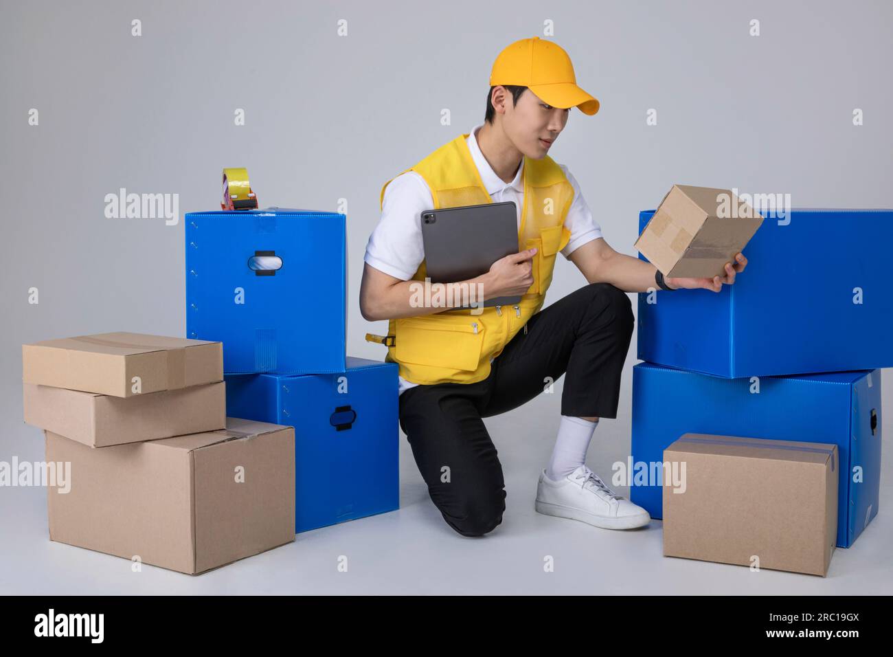 millennials and gen z, korean asian young man working on tablet pc ...