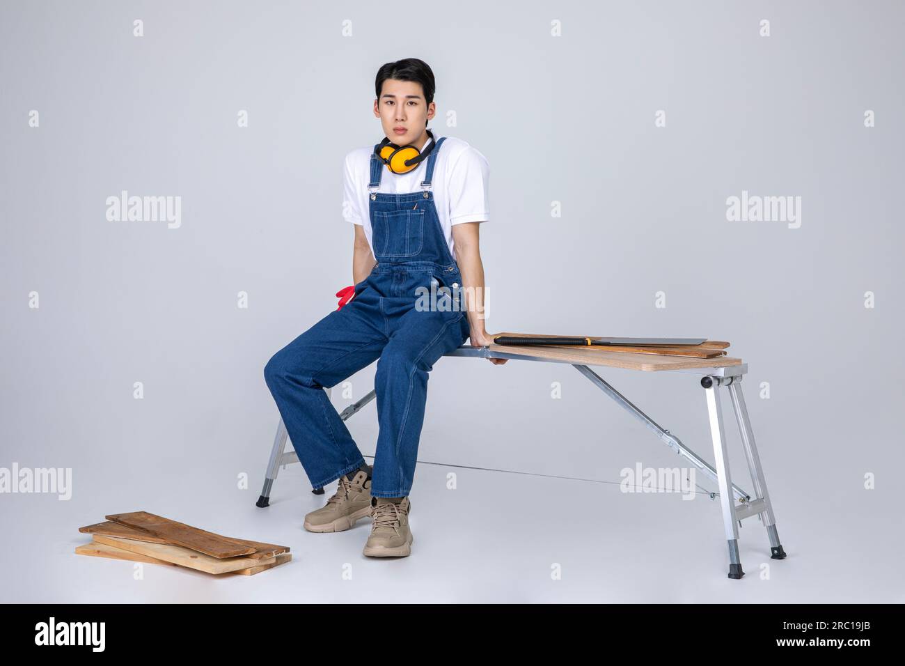 millennials and gen z, korean asian young man carpenter sitting and ...