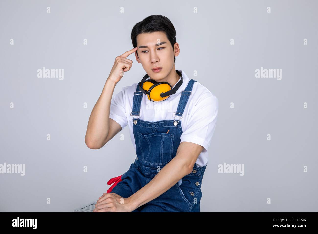 millennials and gen z, korean asian young man carpenter sitting and ...