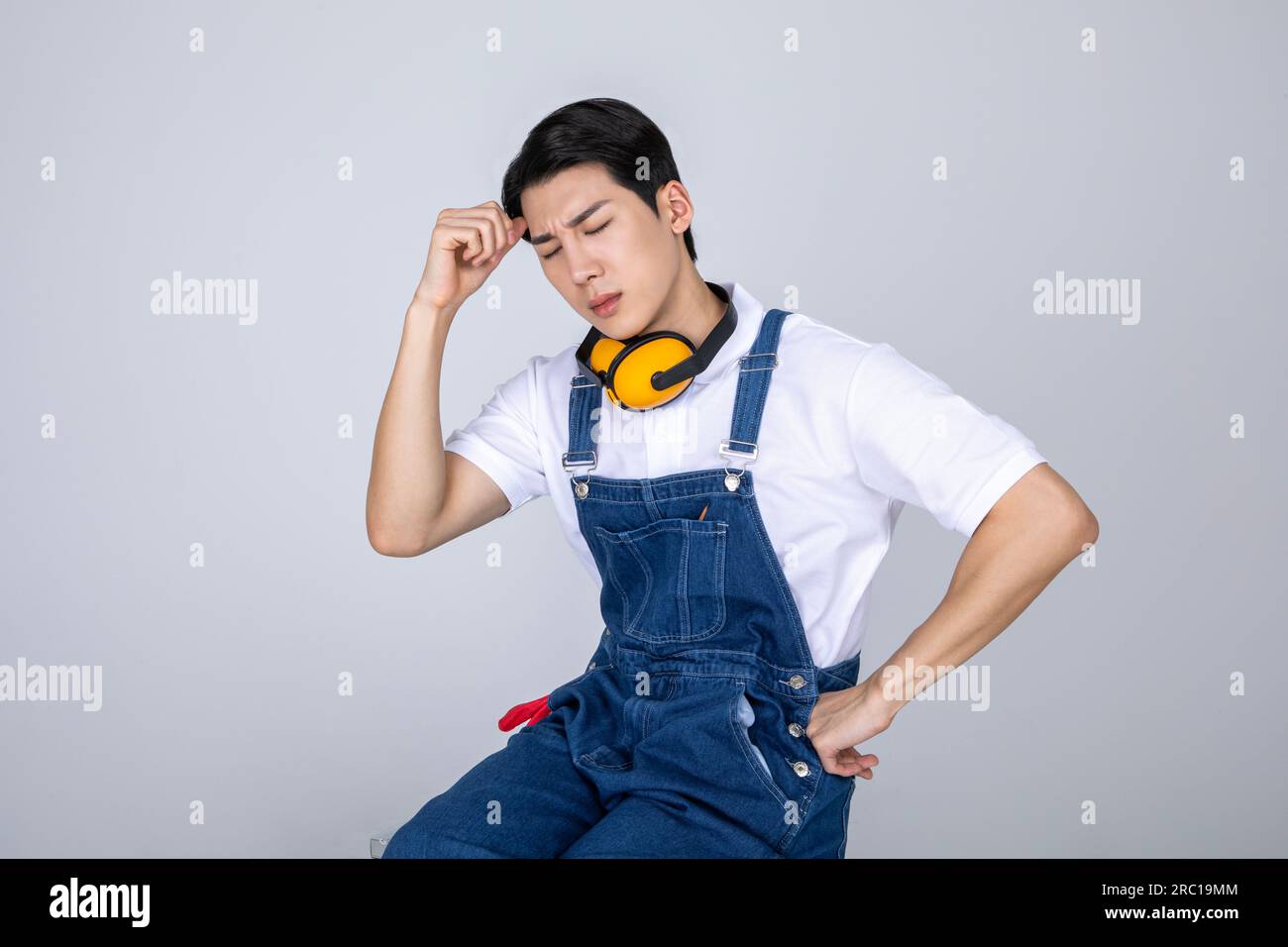 millennials and gen z, korean asian young man carpenter sitting and ...